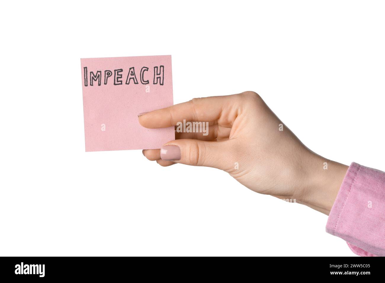 Woman holding piece of paper with word IMPEACH on white background ...