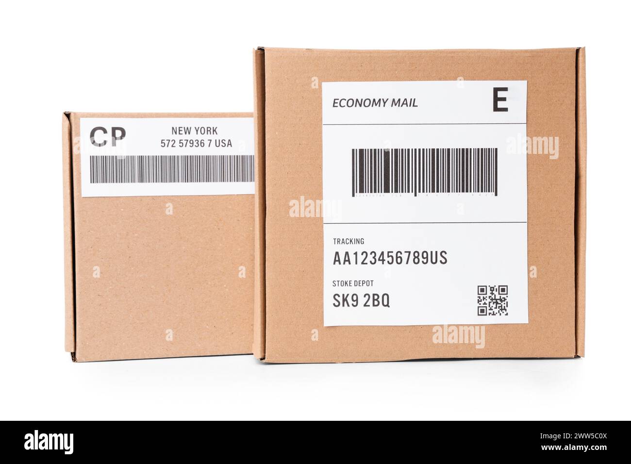Cardboard packages with shipping labels and barcodes on white ...