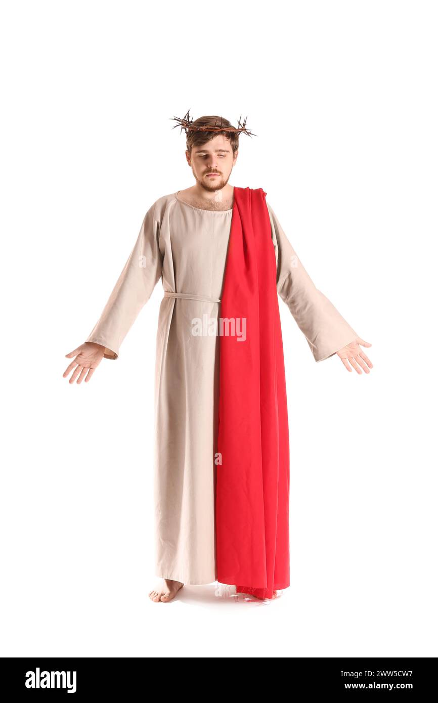 Man in Jesus robe and crown of thorns with outstretched hands on white ...