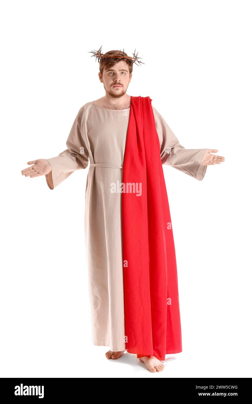 Man in Jesus robe and crown of thorns with outstretched hands on white ...