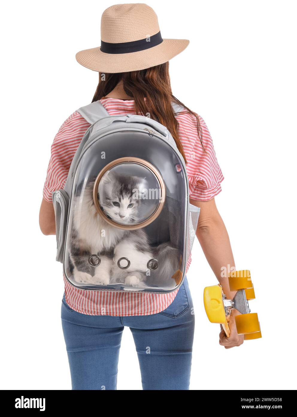 Woman with cat in backpack carrier and skateboard on white background ...