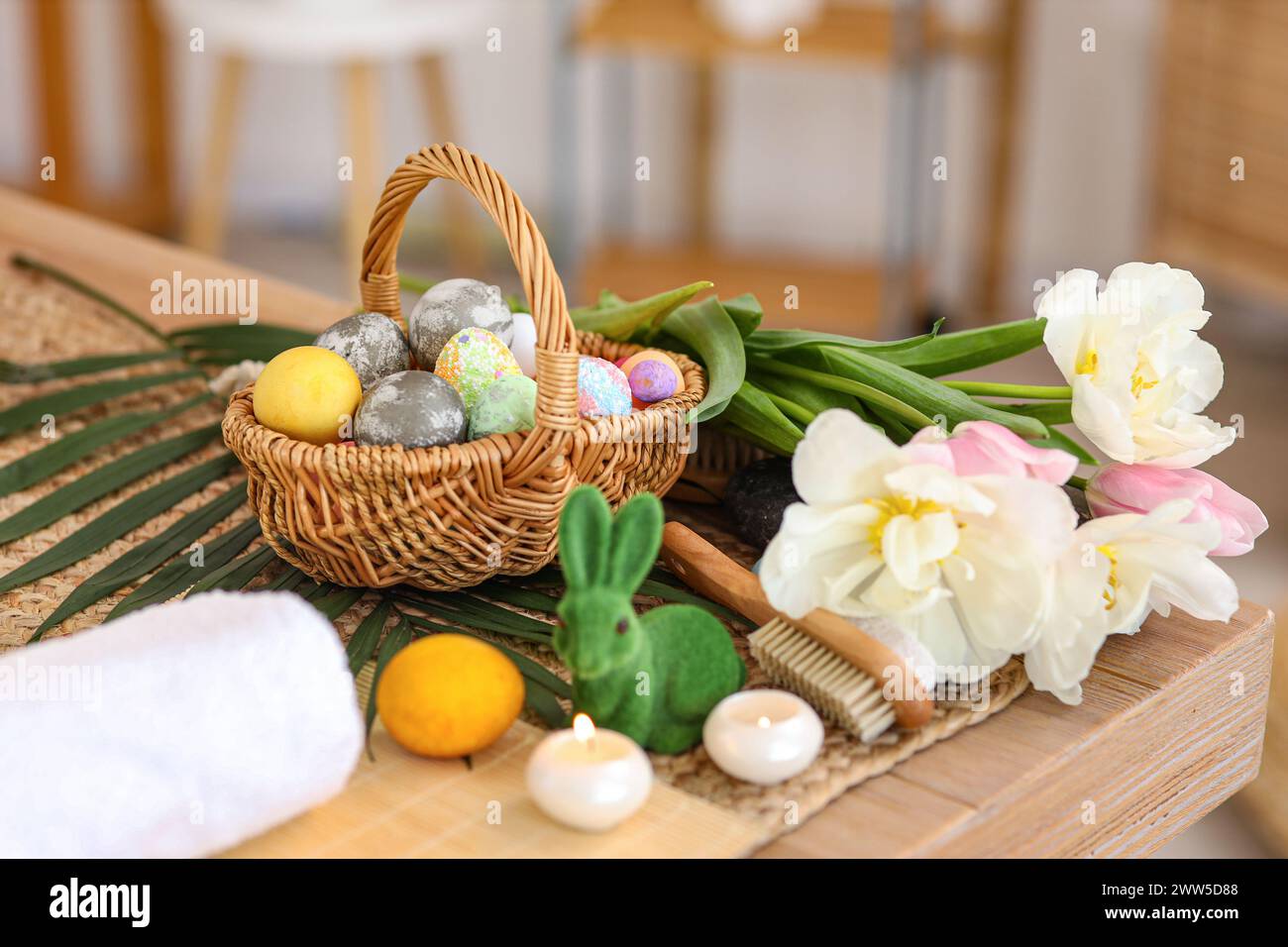 Easter eggs with flowers on table in spa salon, closeup Stock Photo - Alamy