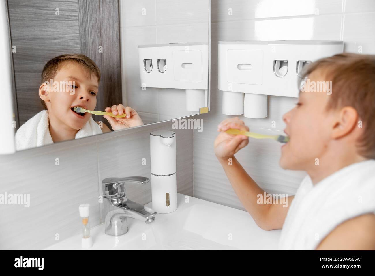 Teenage self-care: a refreshing moment in the bathroom Stock Photo - Alamy