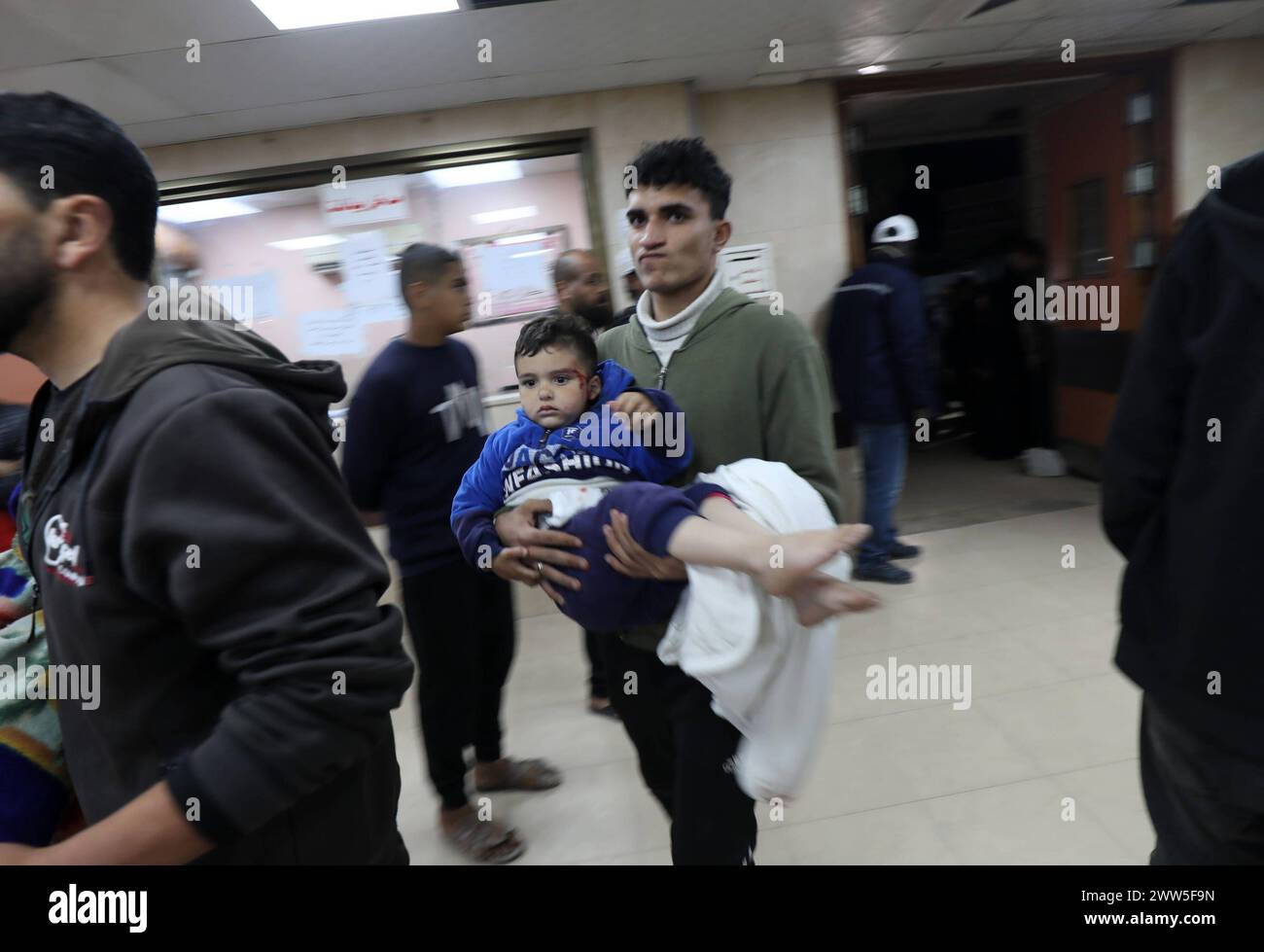 Injured Palestinians, Includ Children are brought to Al-Aqsa Martyrs Hospital in Dair El-Balah ...