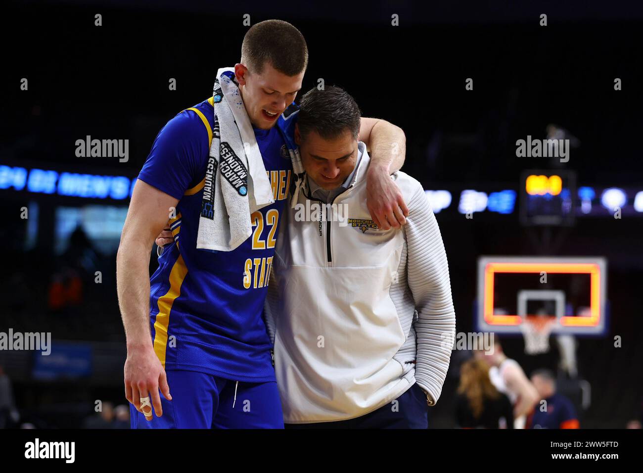 Morehead State guard Riley Minix (22) walks off the court with head ...