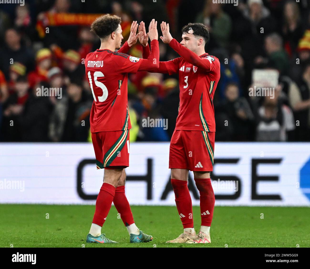Ethan Ampadu of Wales and Neco Williams of Wales celebrates the full ...