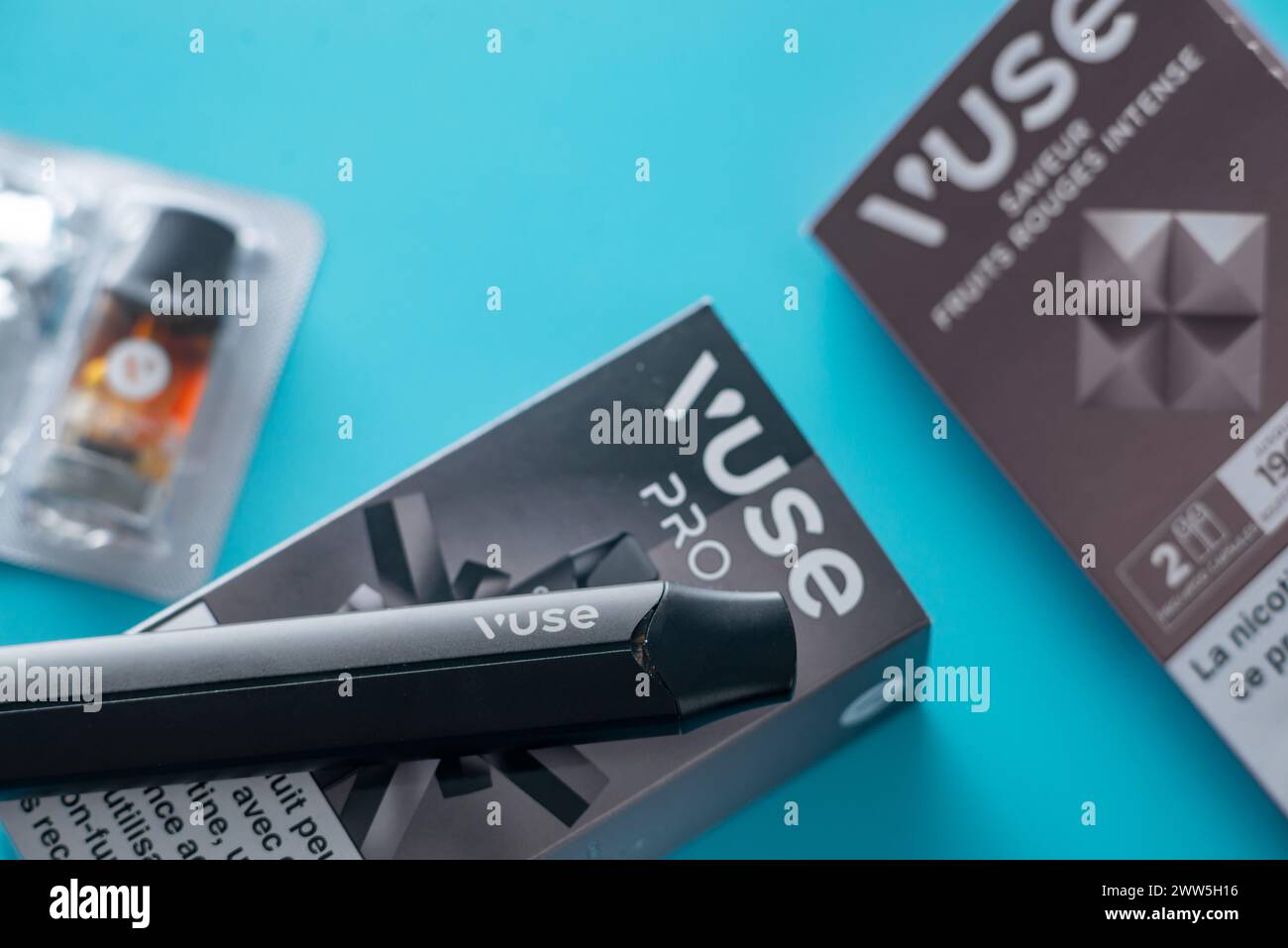 Caen, France - March 18, 2024: A vape and a box of vape juice sit on a ...