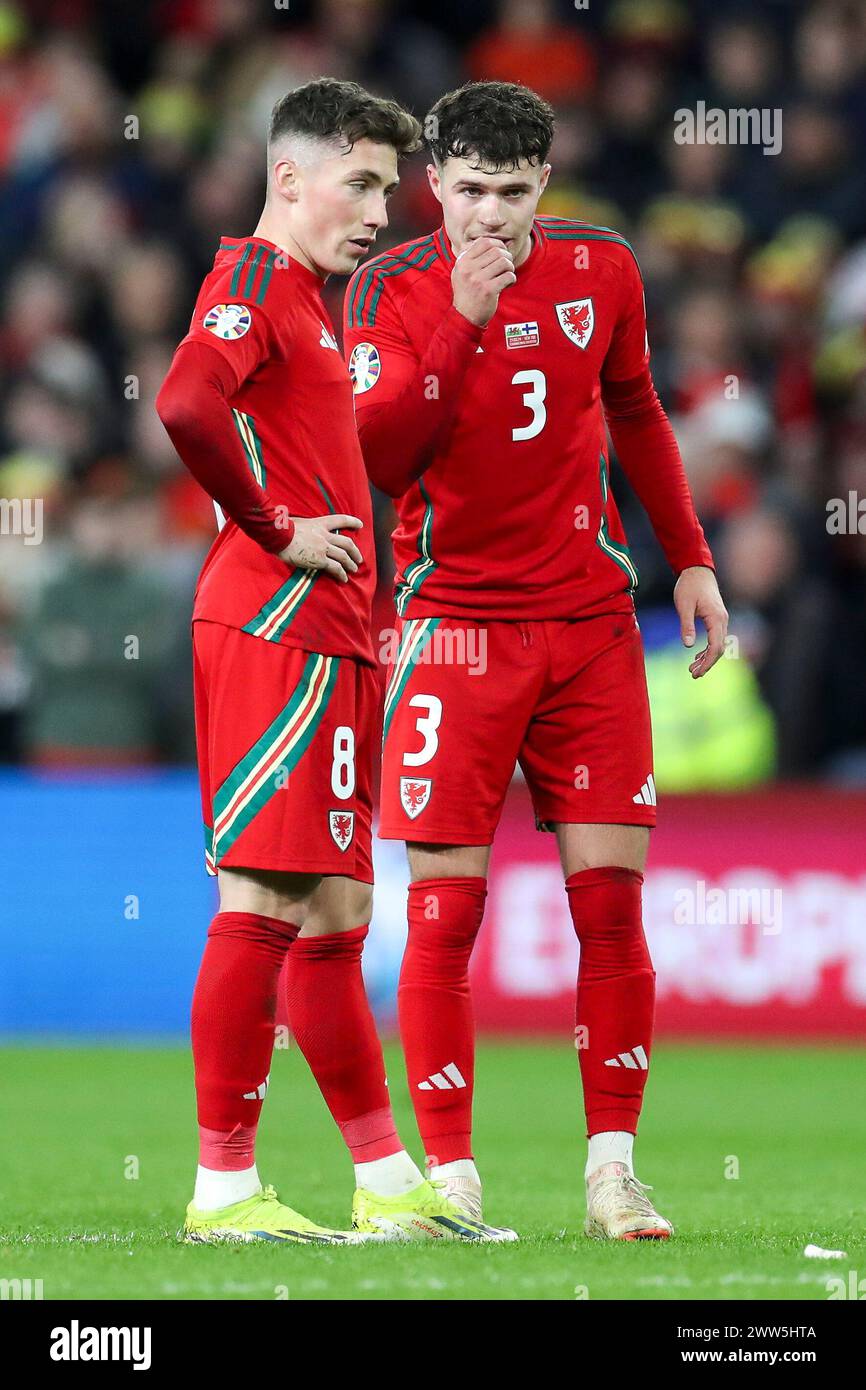 Cardiff, UK. 21st Mar, 2024. Wales Neco Williams and Wales Harry Wilson ...