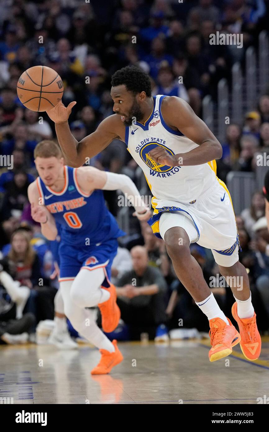 Golden State Warriors forward Andrew Wiggins (22) brings the ball up ...