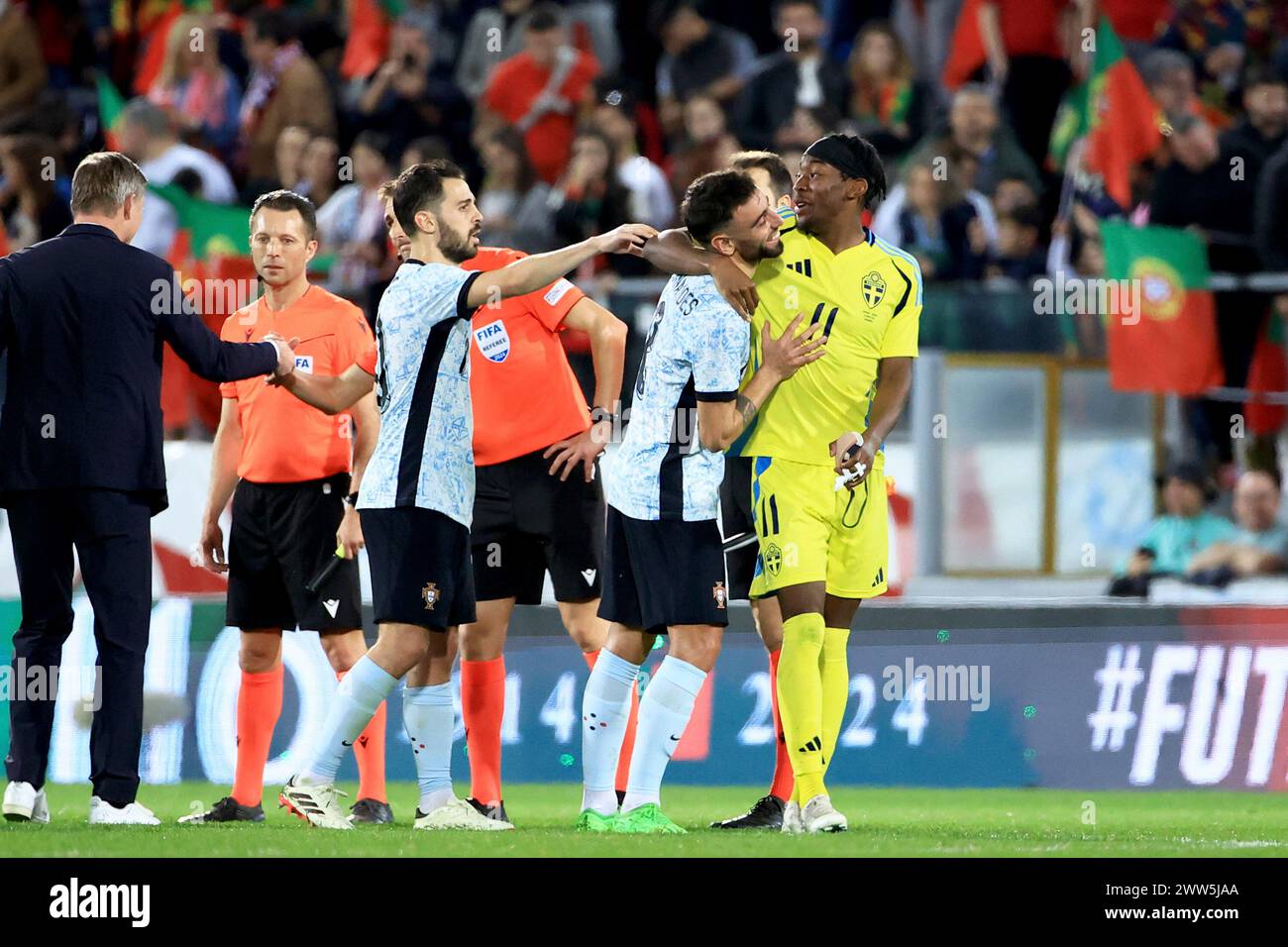 Portugal's Bruno Fernandes embraces Sweden's Anthony Elanga at the end ...