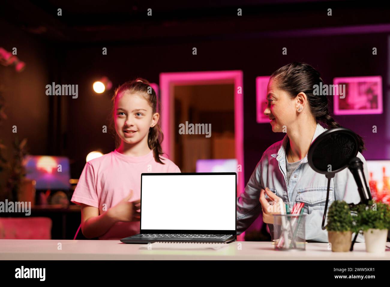 Child media star filming video about best mockup laptops launched this ...
