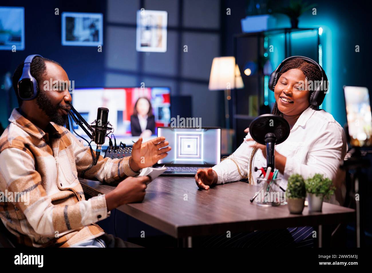 Female influencer laughing during comedy talk show filmed with ...