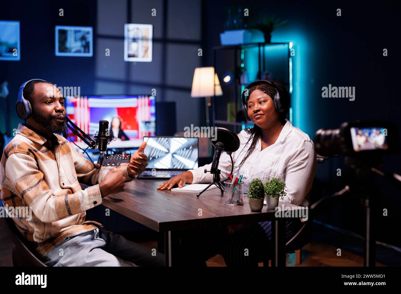Recorded podcast hi-res stock photography and images - Alamy
