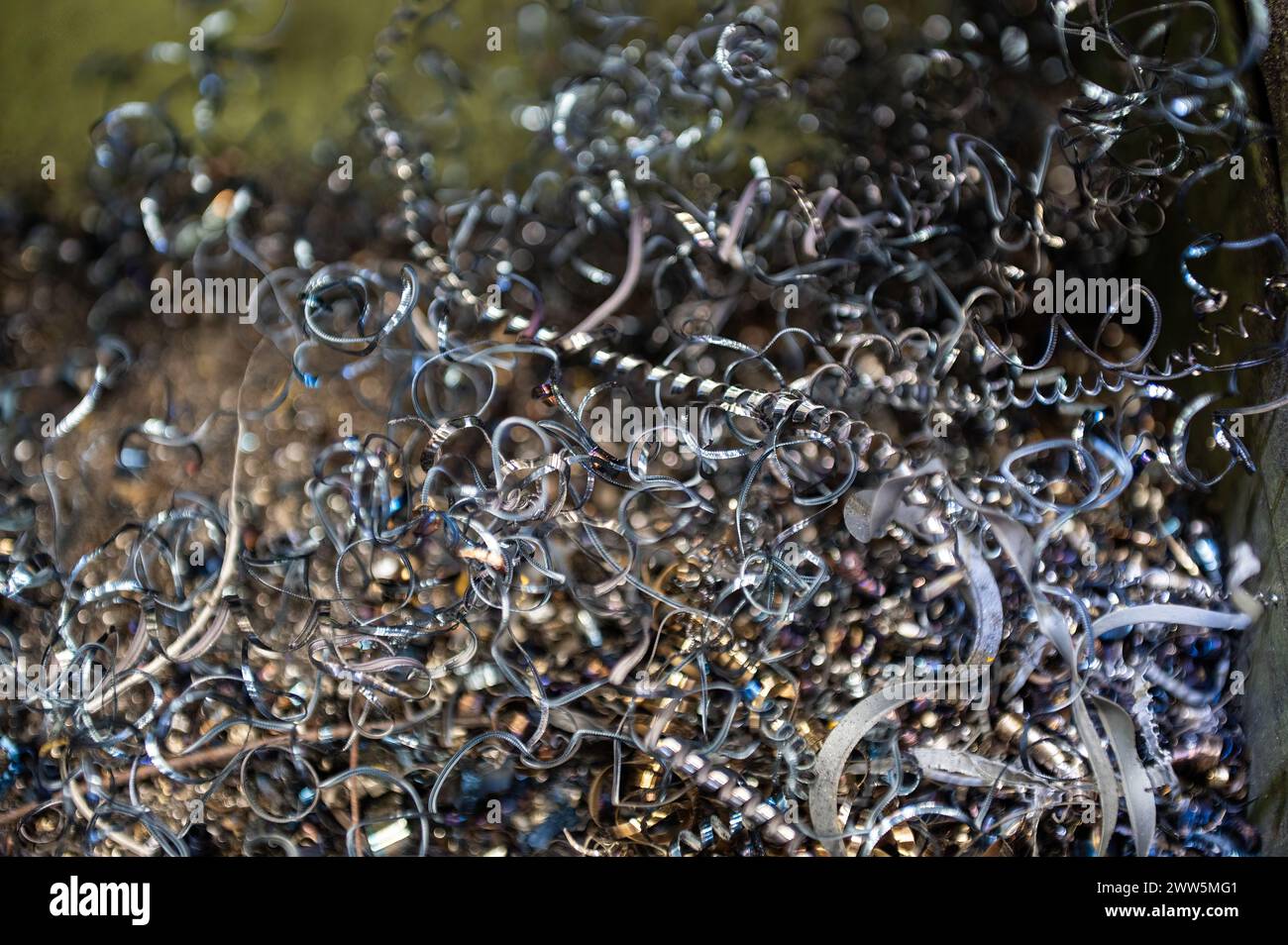 Waste metal parts from metal milling machine Stock Photo - Alamy
