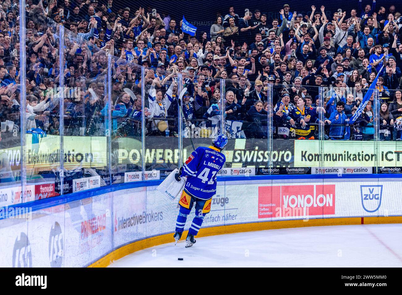 Zug. March 21, 2024, Leon Muggli #41 (EV Zug) is once again celebrated ...