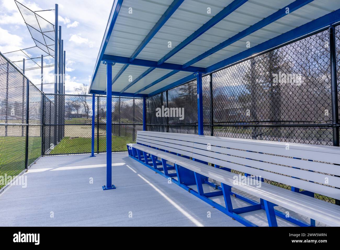 View of typical nondescript high school baseball softball dugout with ...