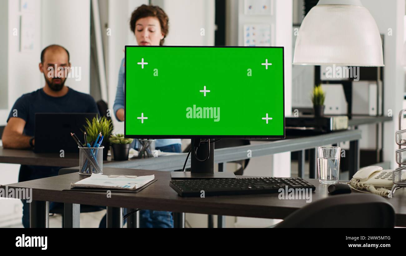 Greenscreen template on pc in office, modern computer showing isolated chromakey display in ...