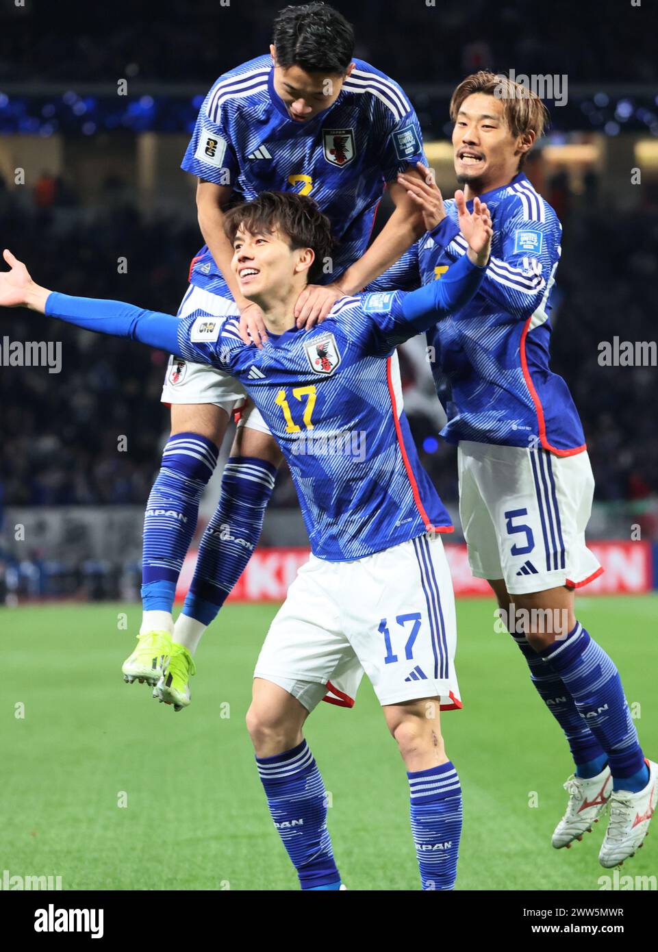 Tokyo, Japan. 21st Mar, 2024. Japan's Ao Tanaka is celebrated from his ...