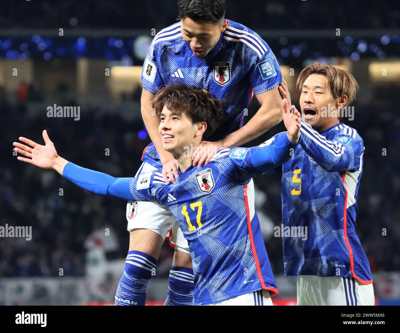Tokyo, Japan. 21st Mar, 2024. Japan's Ao Tanaka is celebrated from his ...