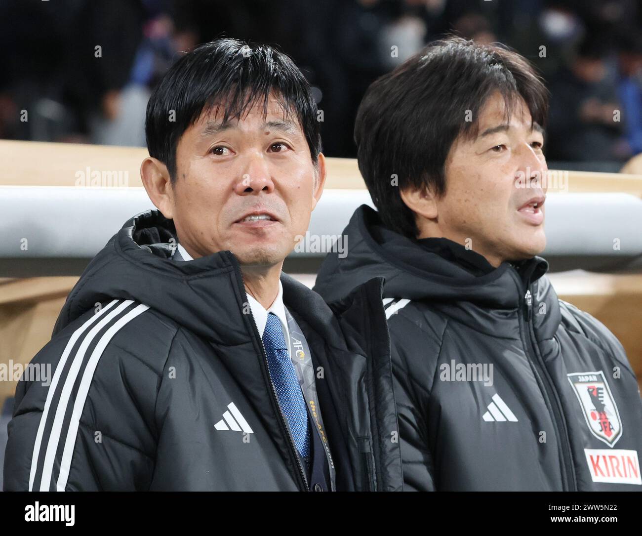 Tokyo, Japan. 21st Mar, 2024. Japan's head coach Hajime Moriyasu (L ...