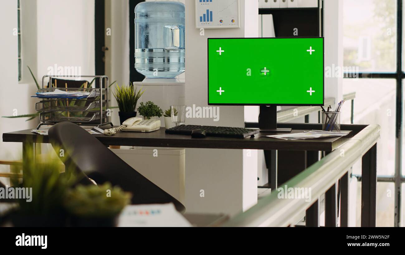Empty coworking space with pc running isolated greenscreen, blank ...