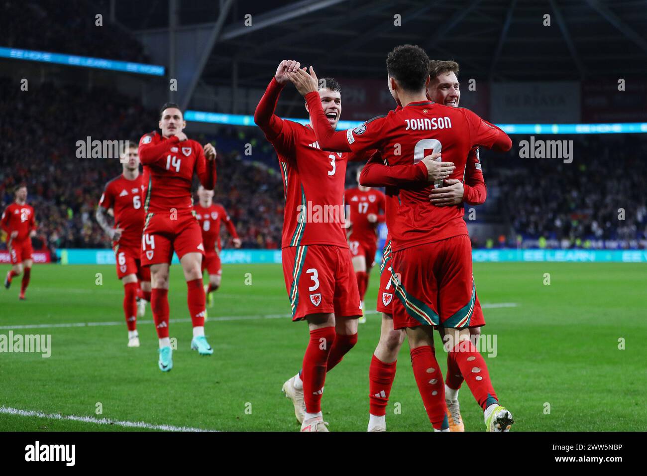 Brennan Johnson of Wales (9) celebrates with teammates Neco Williams (3 ...