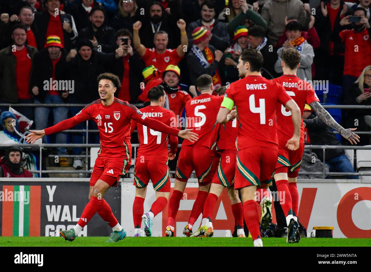 Cardiff, Wales. 21 March 2024. Wales players celebrate their opening ...