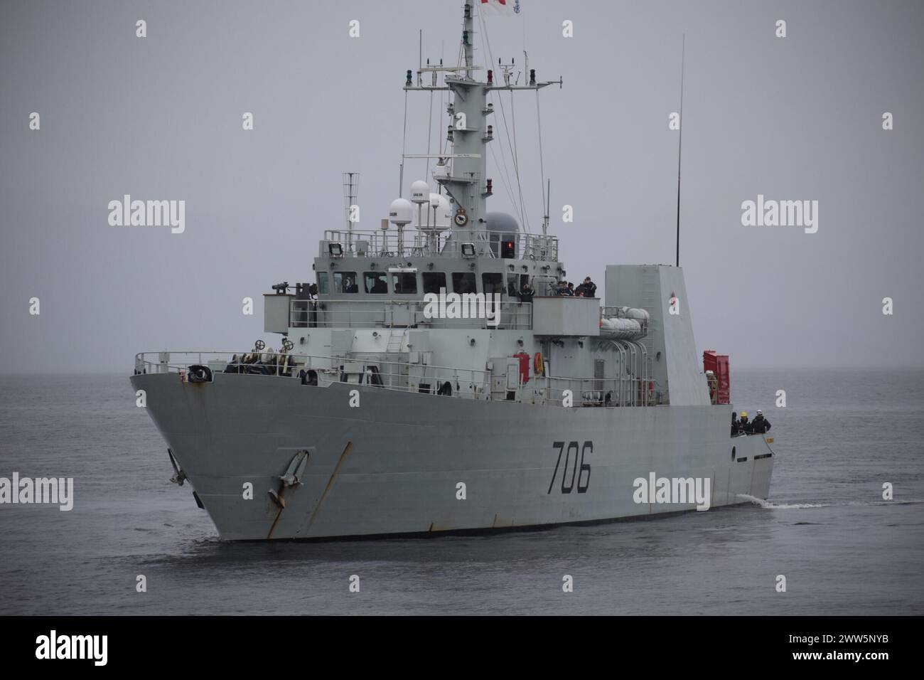 Royal Canadian Navy Vessel HMCS Yellowknife prepares for a towing ...