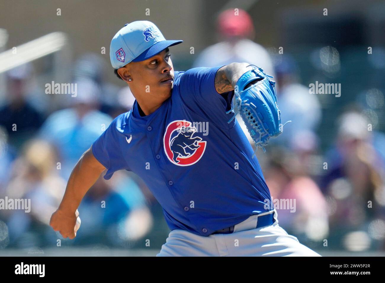 Chicago Cubs starting pitcher Yency Almonte throws against the Colorado ...