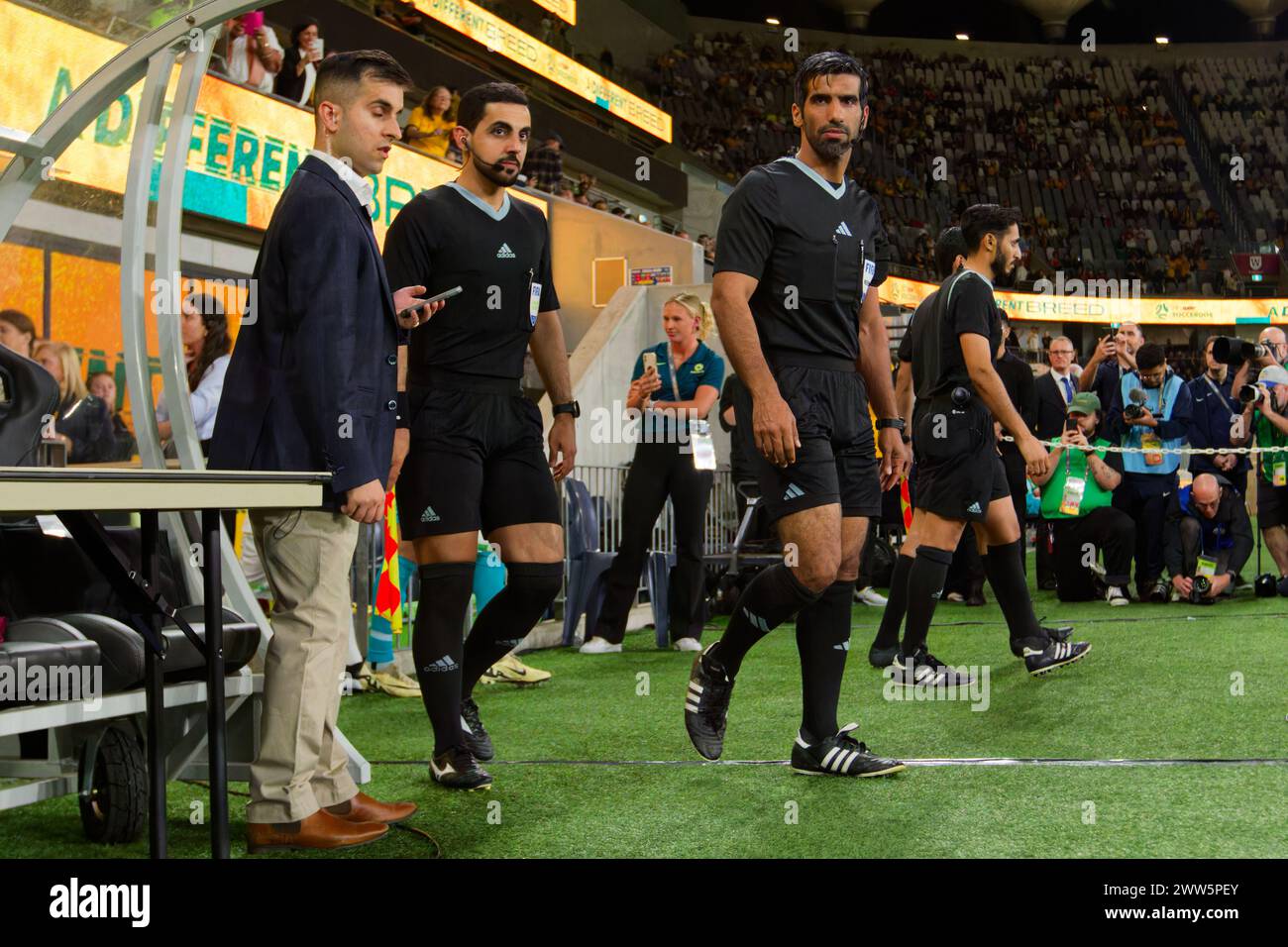 Sydney, Australia. 21st Mar, 2024. Match referees walk onto the pitch ...
