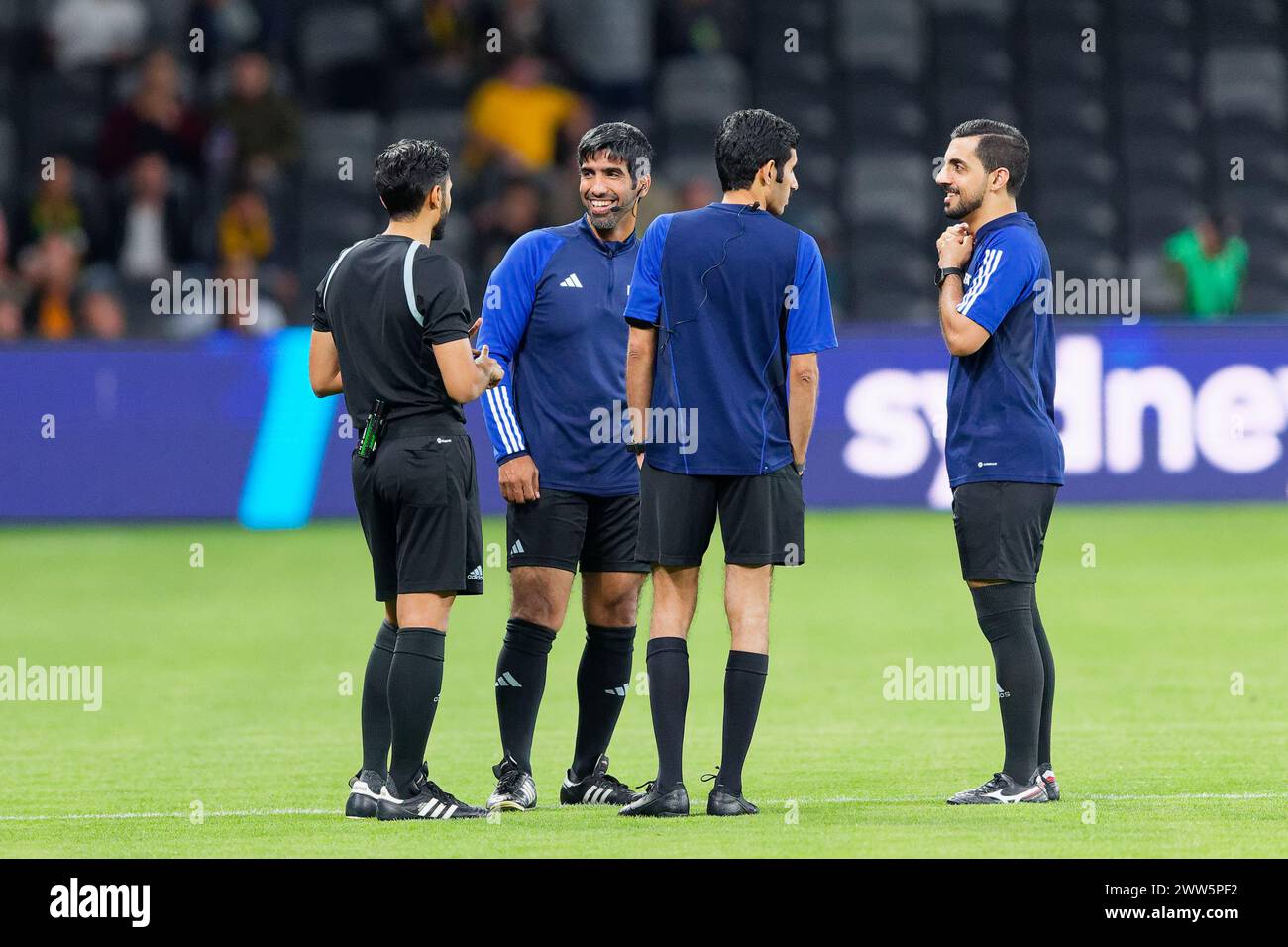 Sydney, Australia. 21st Mar, 2024. Match referees prepare to warm up ...