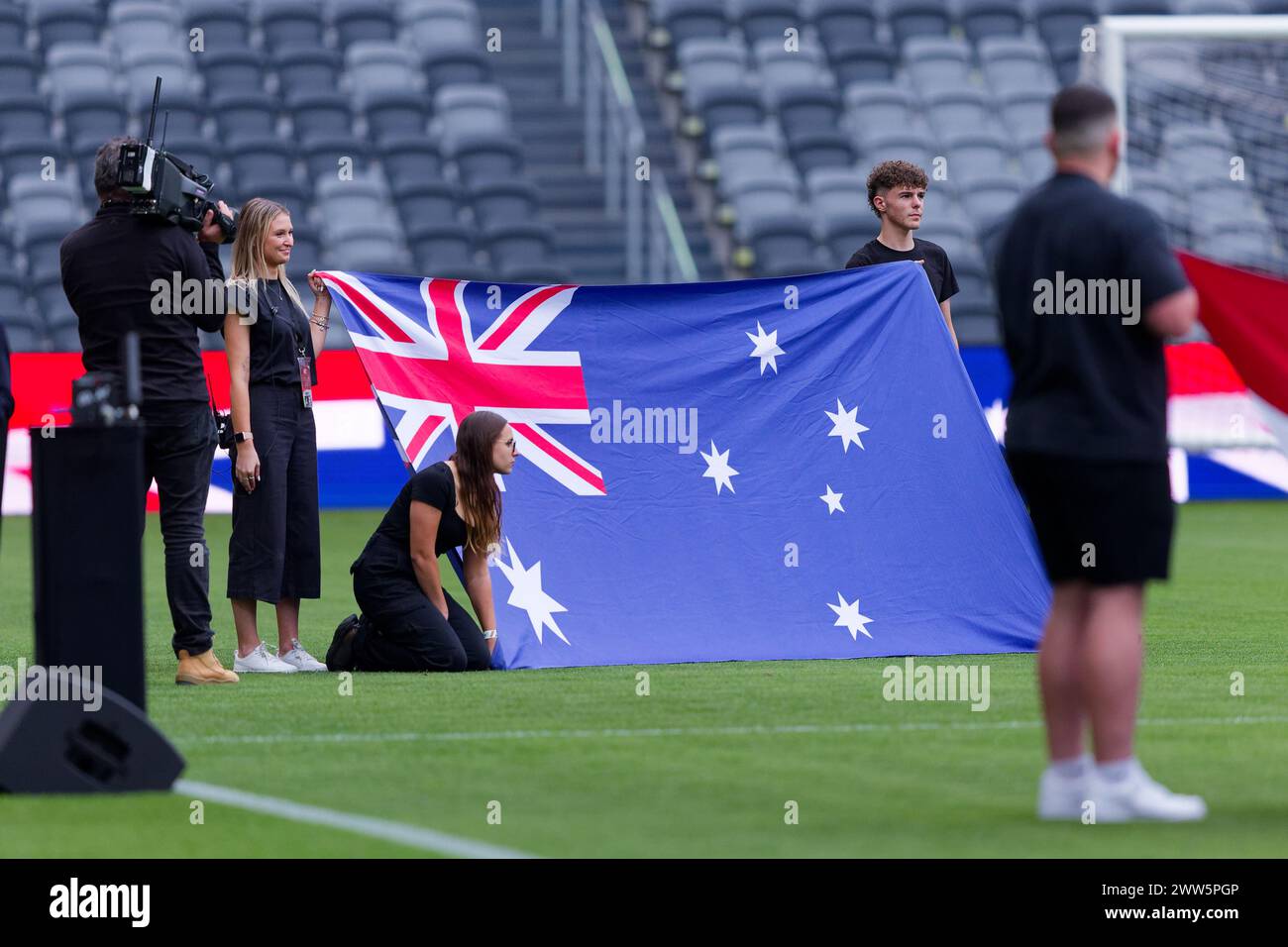 Sydney, Australia. 21st Mar, 2024. The Australian flag is displayed on ...