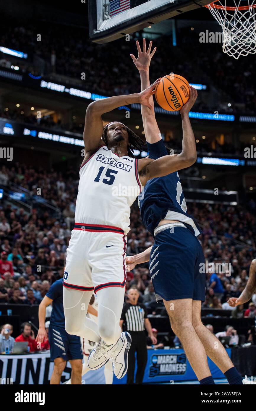 Dayton forward DaRon Holmes II (15) shoots past Nevada forward Nick ...