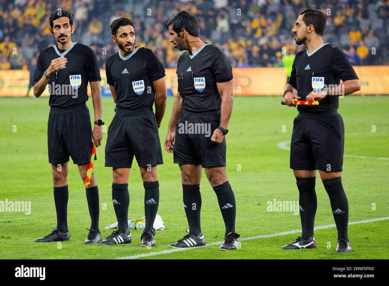 Sydney, Australia. 21st Mar, 2024. Match referees line up together ...