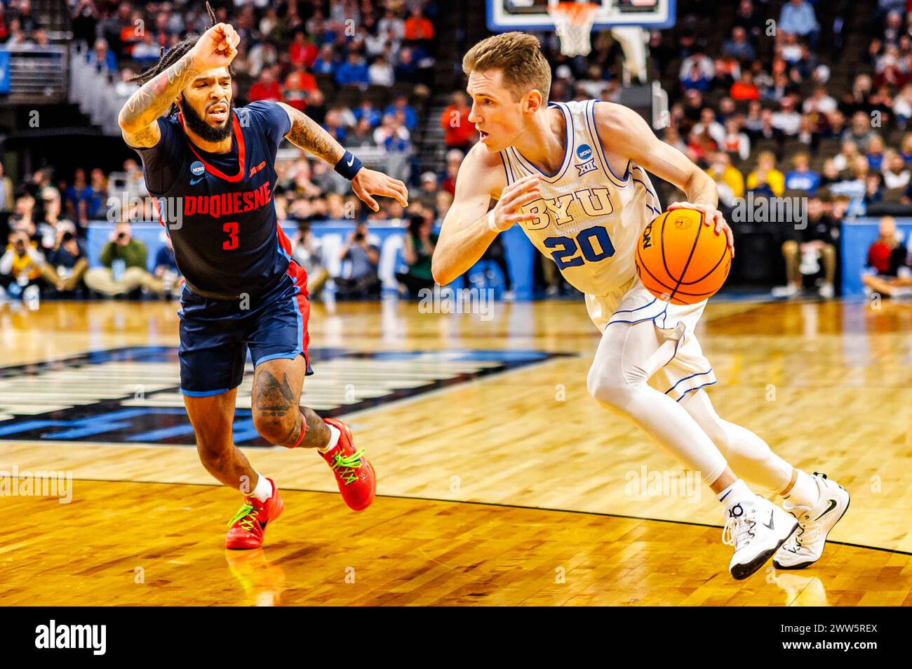 Omaha, NE. U.S. 21st Mar, 2024. Brigham Young Cougars guard Spencer ...