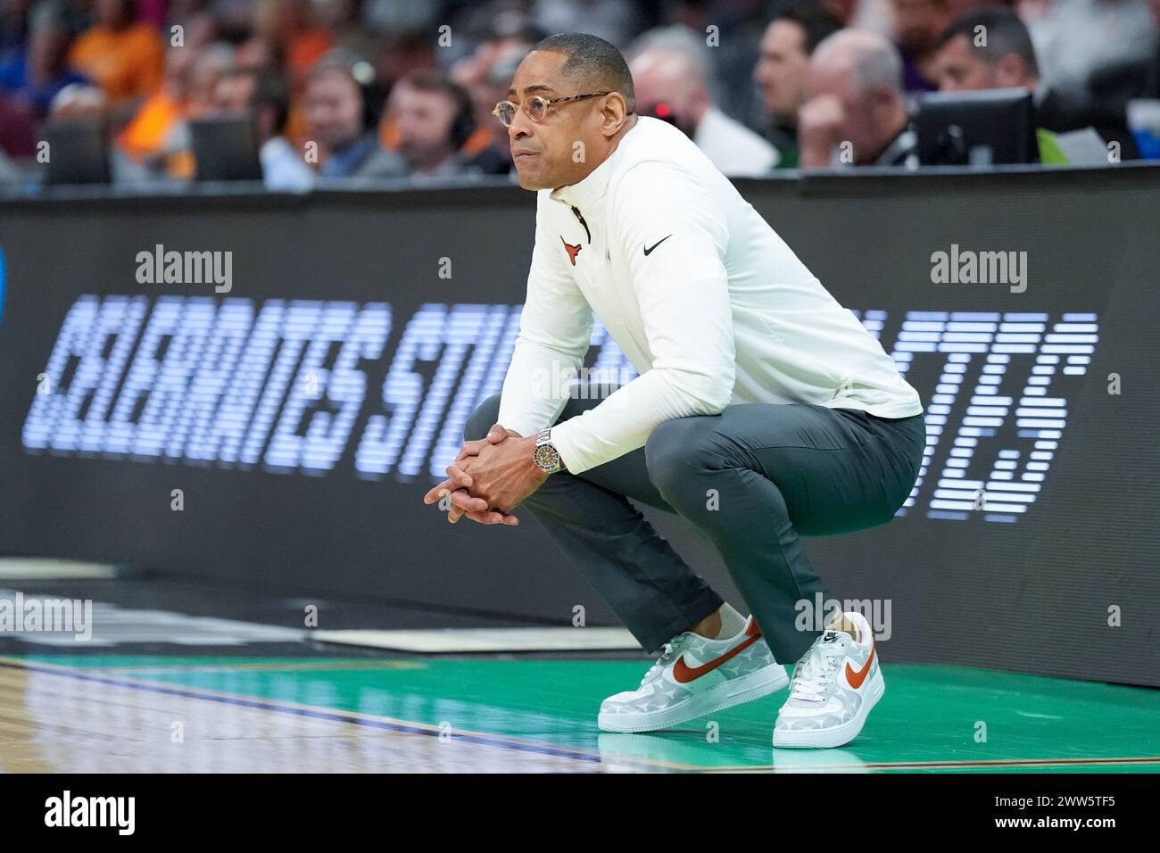 Texas head coach Rodney Terry watches during the first half of a first ...