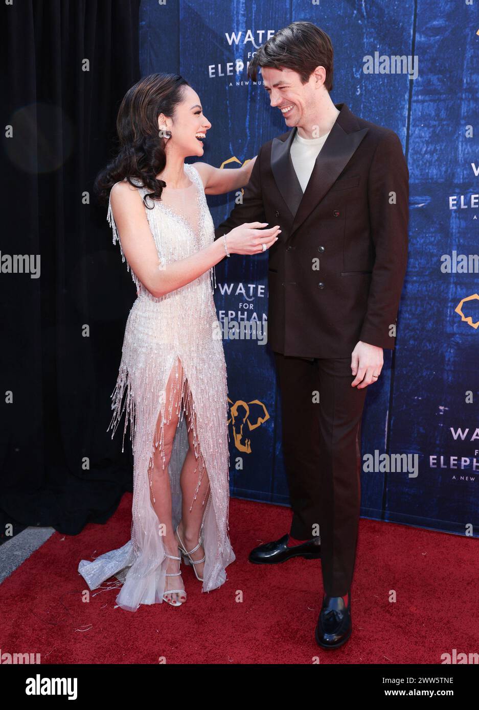 Isabelle McCalla, left, and Grant Gustin attend the Broadway opening night for "Water For ...