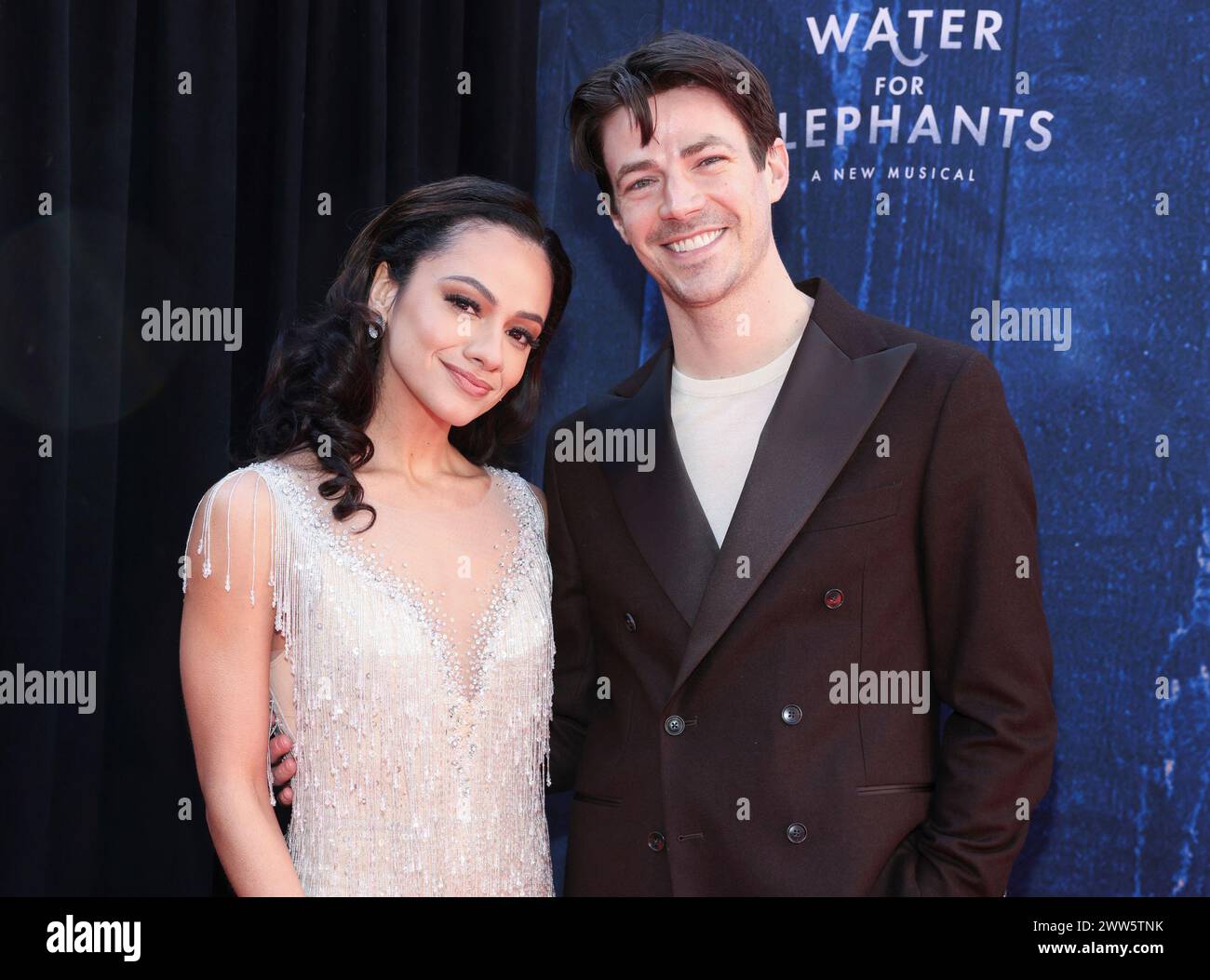 Isabelle McCalla, left, and Grant Gustin attend the Broadway opening night for "Water For ...