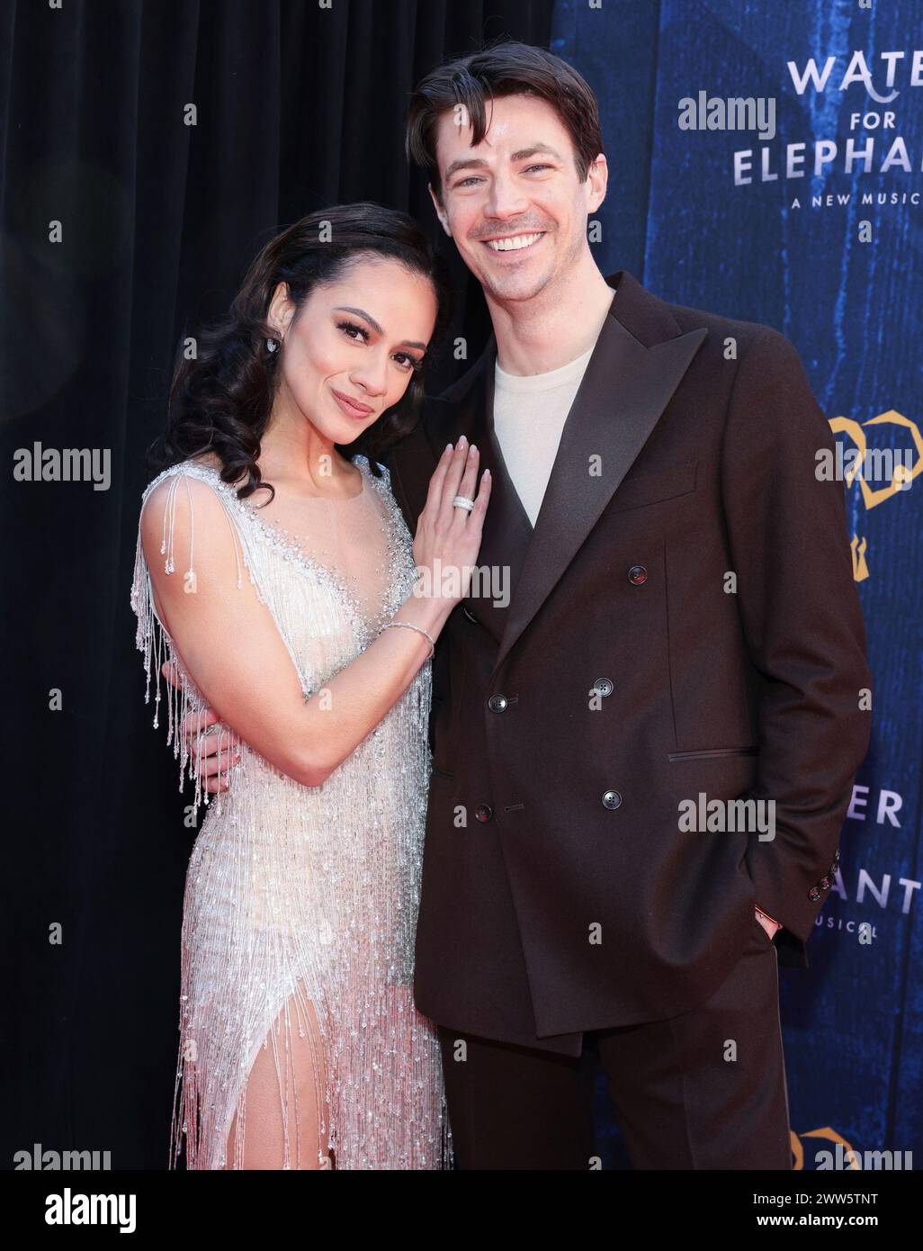 Isabelle McCalla, left, and Grant Gustin attend the Broadway opening night for "Water For ...