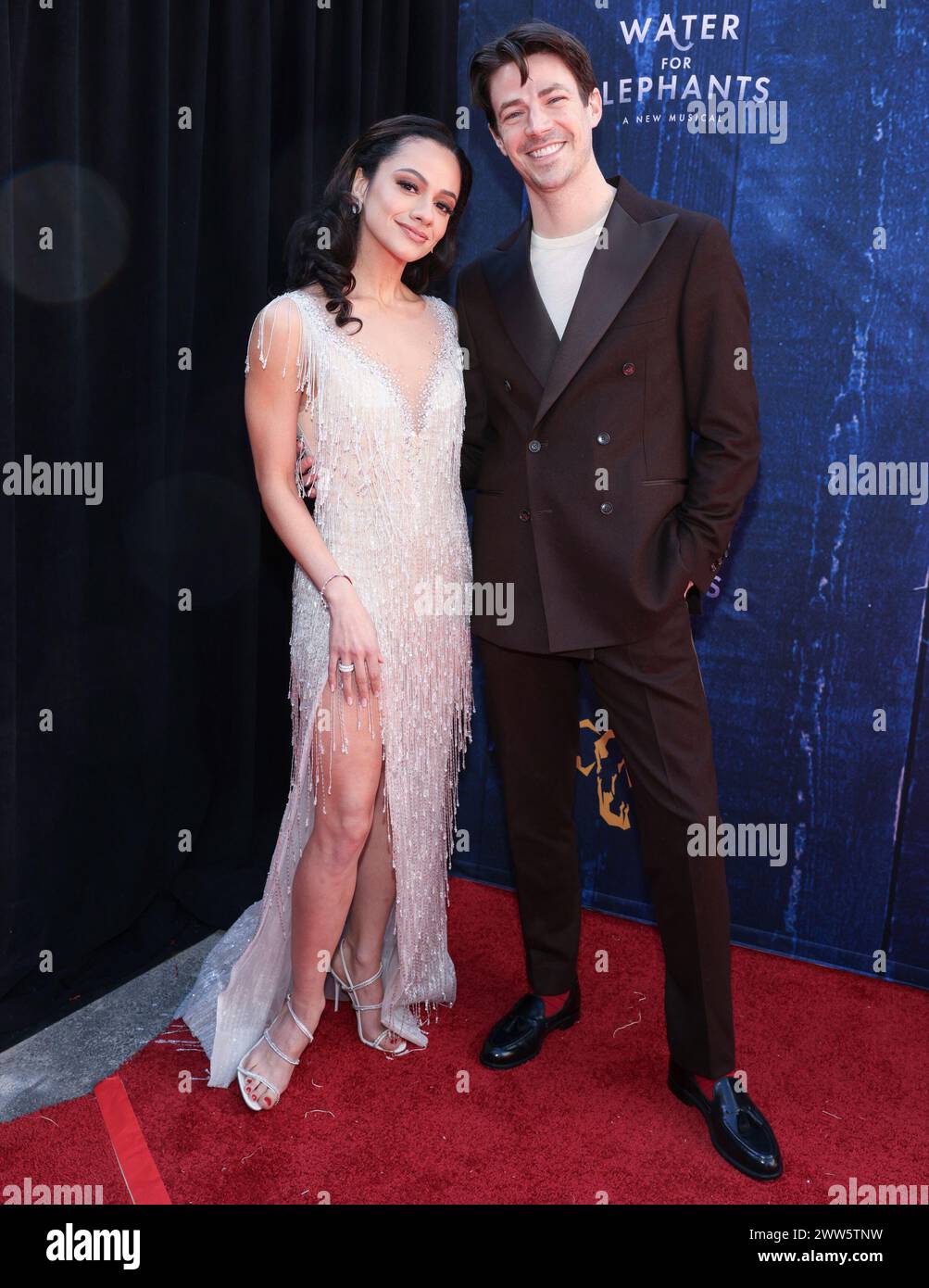 Isabelle McCalla, left, and Grant Gustin attend the Broadway opening night for "Water For ...