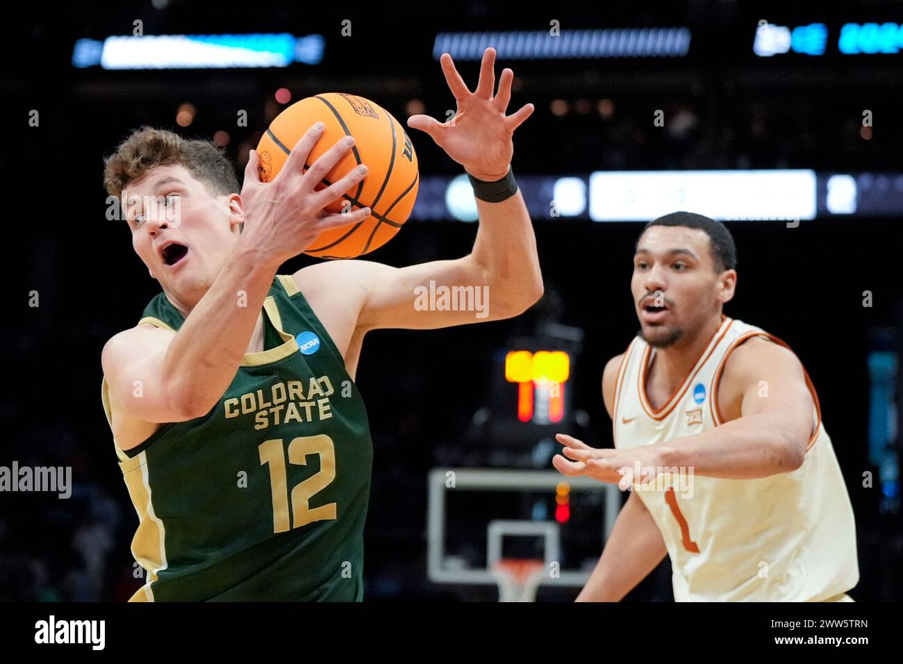 Colorado State forward Patrick Cartier pulls a rebound away from Texas ...