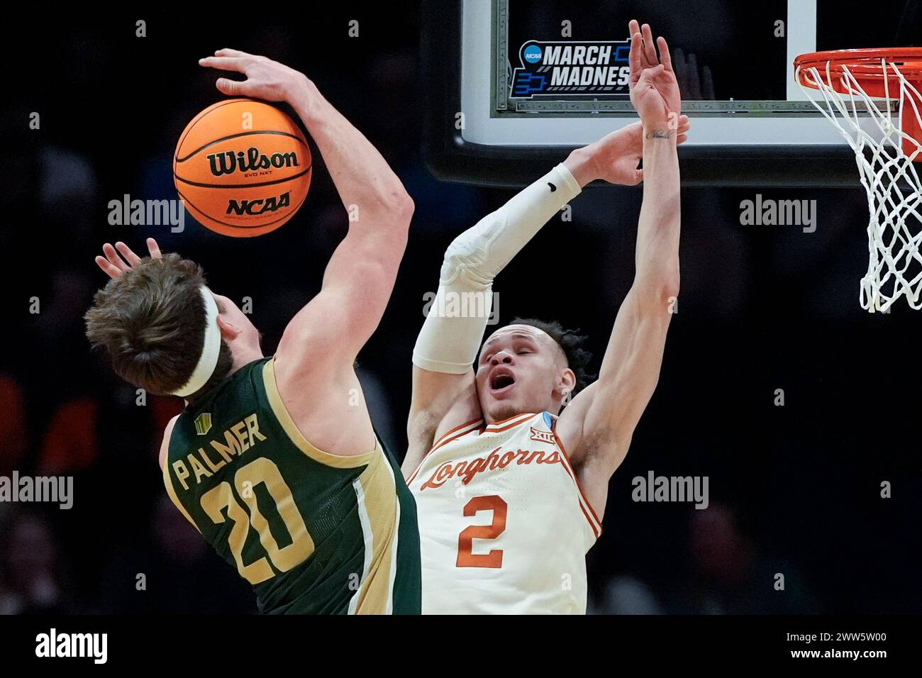 Texas guard Chendall Weaver blocks a shot by Colorado State guard Joe ...