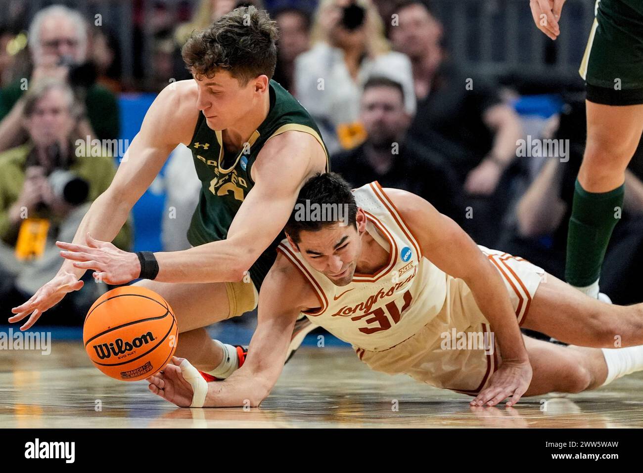 Colorado State forward Patrick Cartier (12) and Texas forward Brock ...