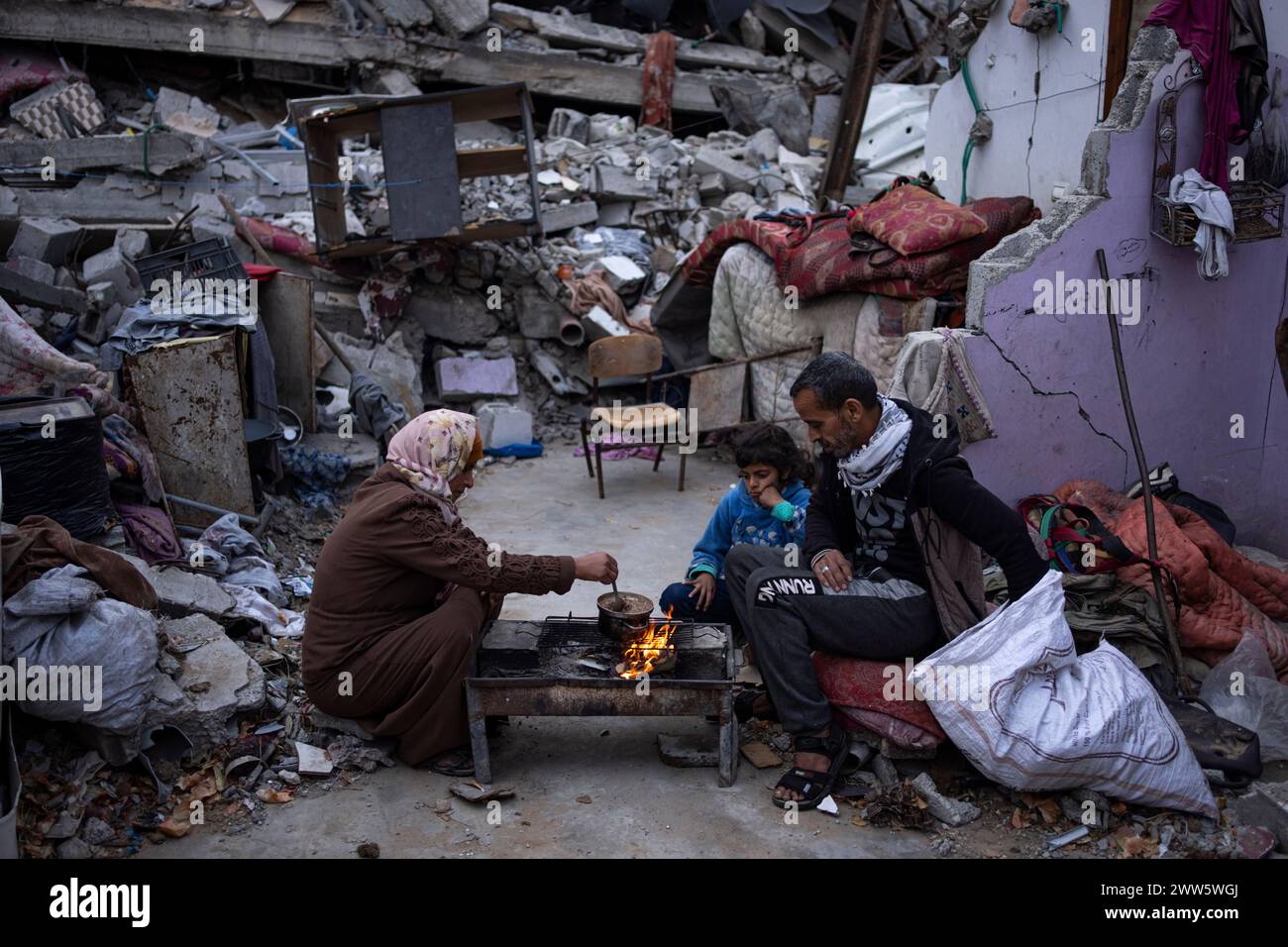 Members of the Al-Rabaya family break their fast during the Muslim holy ...