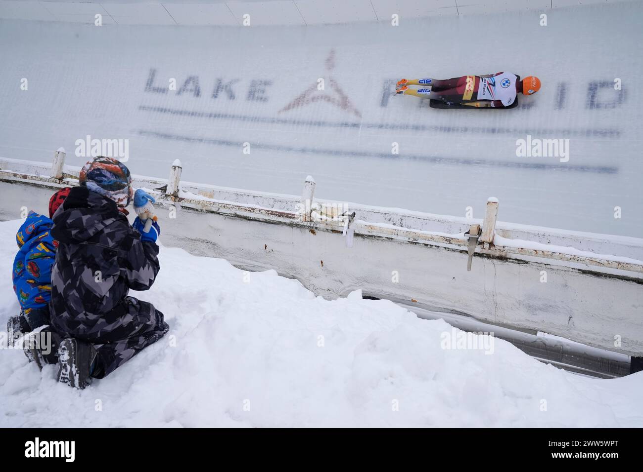 Axel Jungk, of Germany, takes a curve as spectators watch during a ...