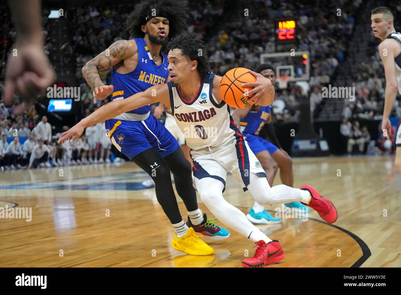 Gonzaga guard Ryan Nembhard (0) drives around McNeese State guard Mike ...