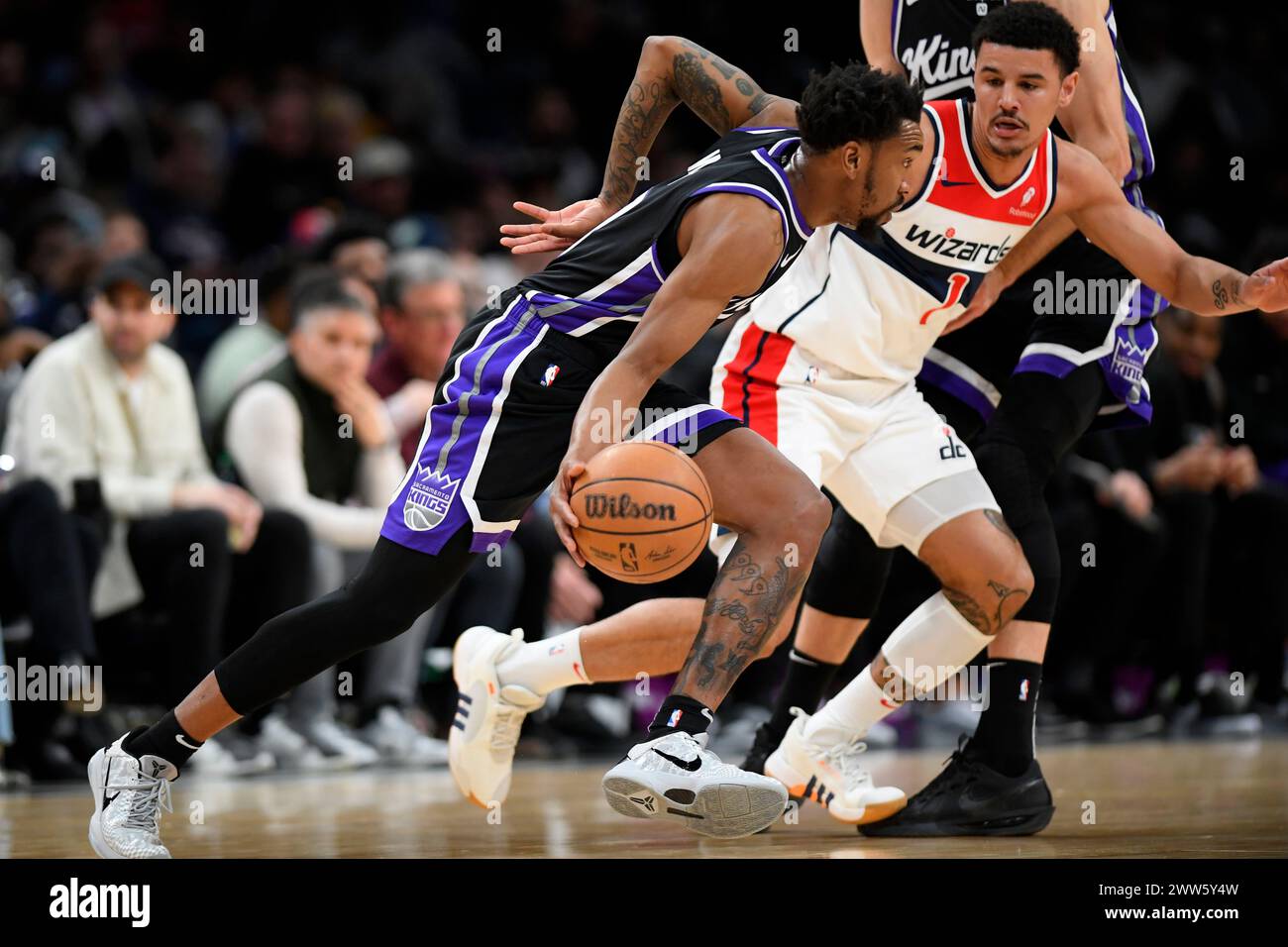 Sacramento Kings guard Malik Monk, left, drives past Washington Wizards ...
