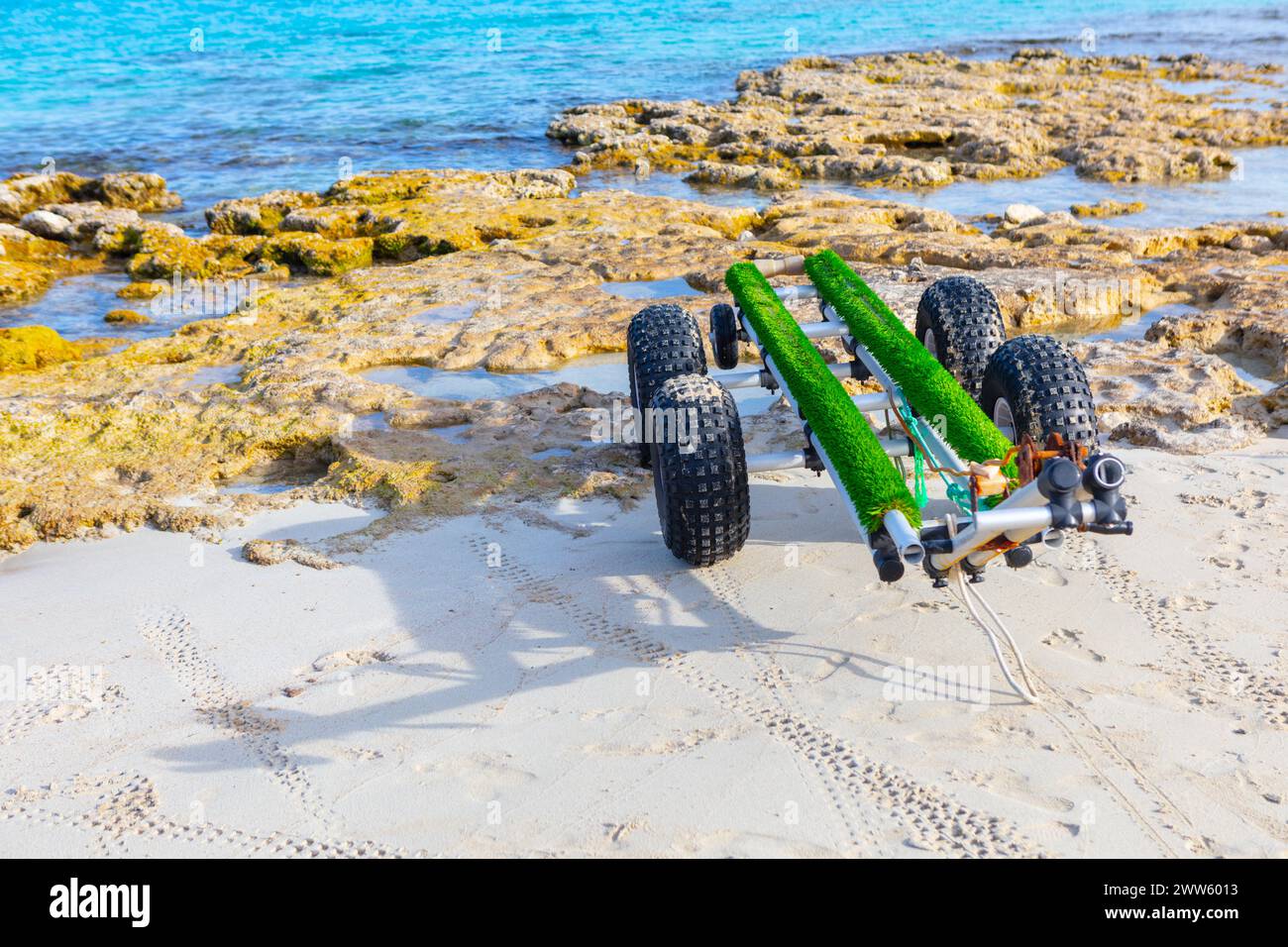 Boat trailer on the beach. Beach boat launch and retrieval Stock Photo ...