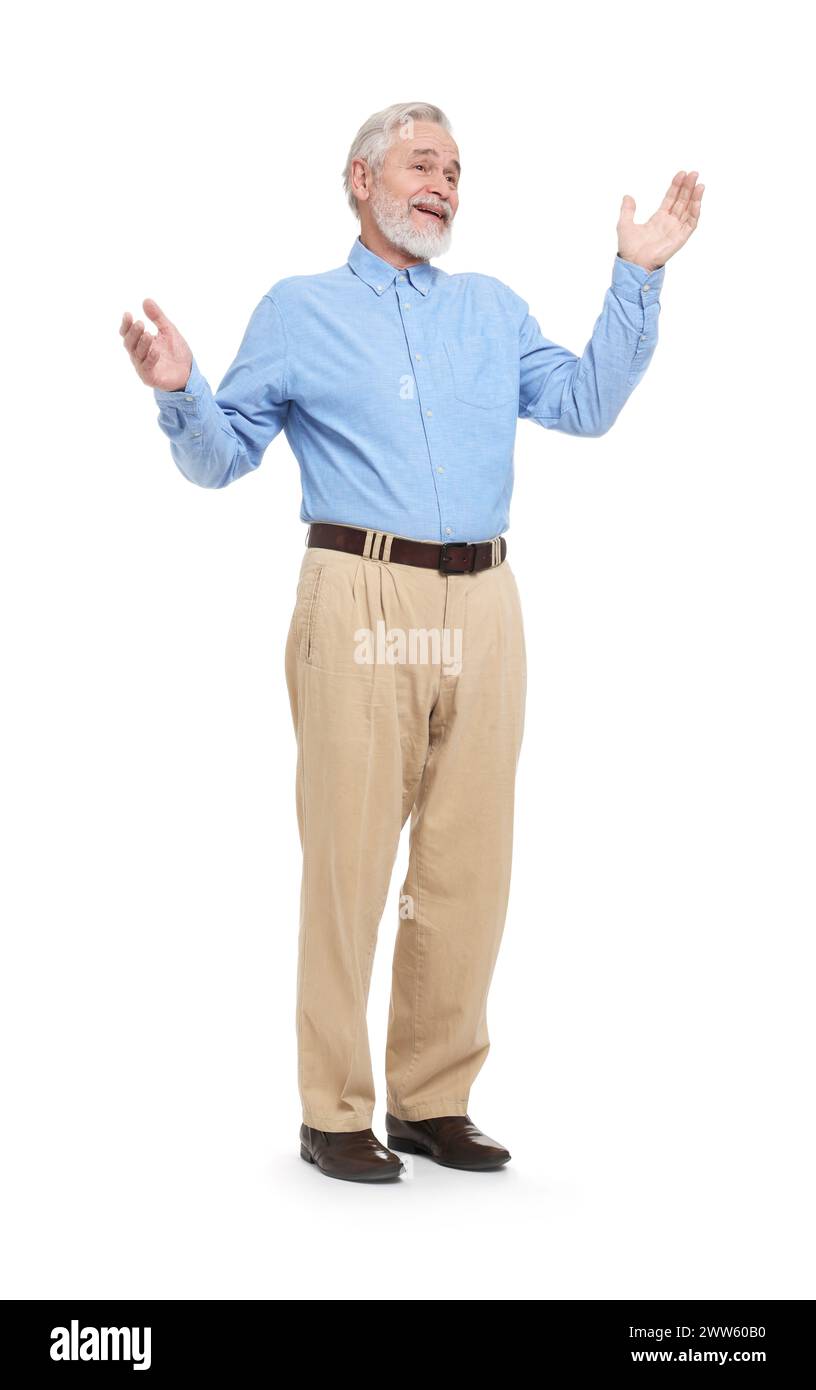 Senior man greeting someone on white background Stock Photo - Alamy