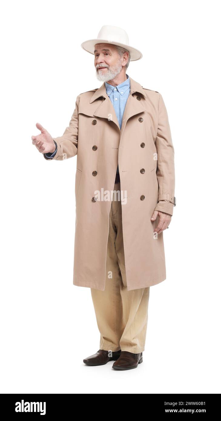 Senior man greeting someone on white background Stock Photo - Alamy